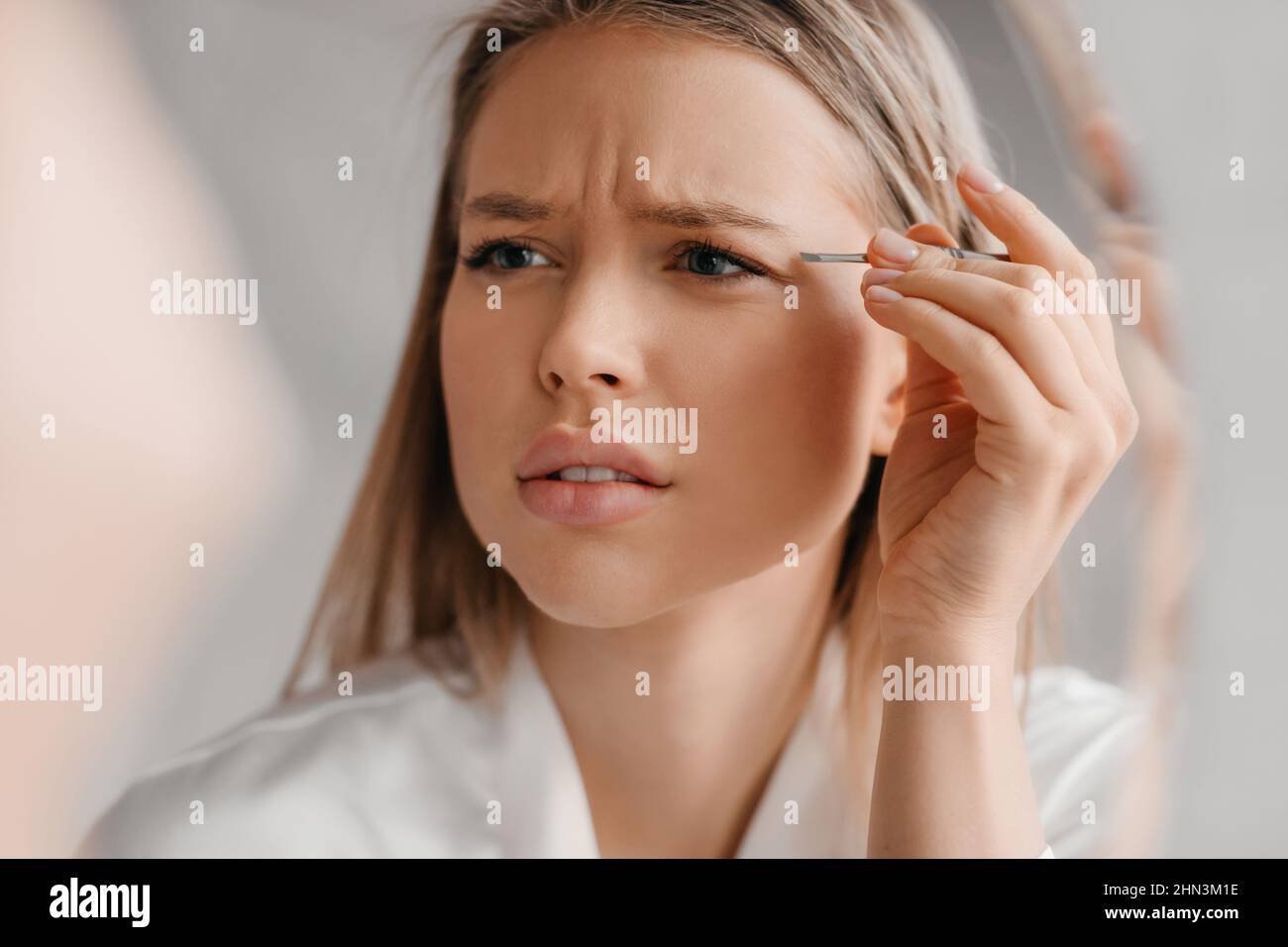 Plucking tool hi-res stock photography and images - Alamy