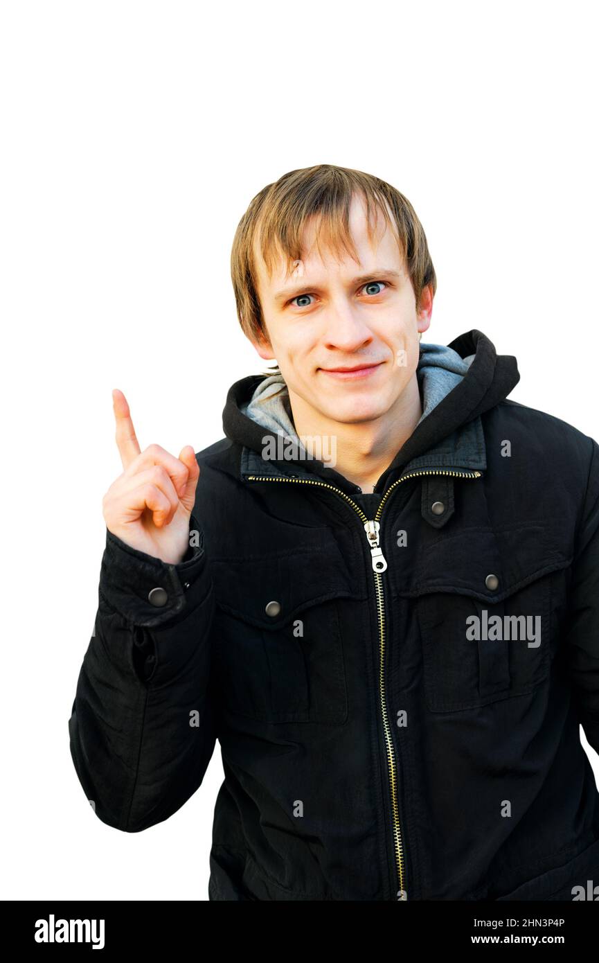 young man shows attention sign. one finger upwards Stock Photo - Alamy