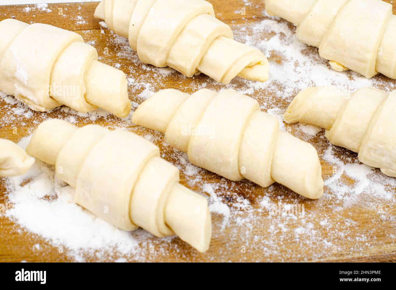 Puff pastry, frozen croissants on board. Studio Photo Stock Photo - Alamy
