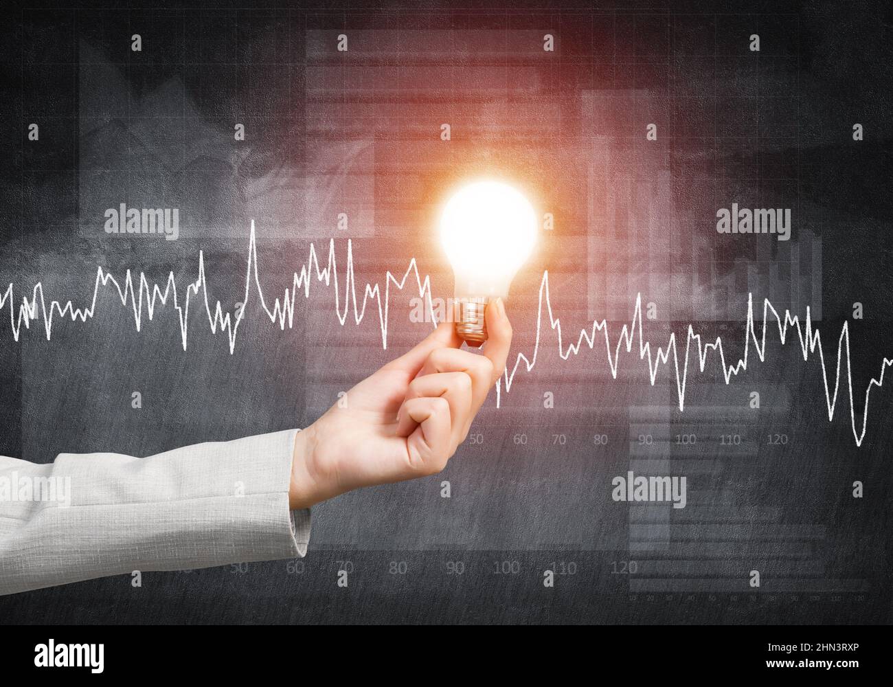 Hand holding glowing business chart hi-res stock photography and images ...