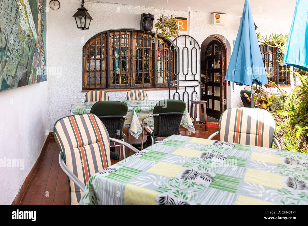 Interior view chairs and table setup inside a cafe Stock Photo - Alamy