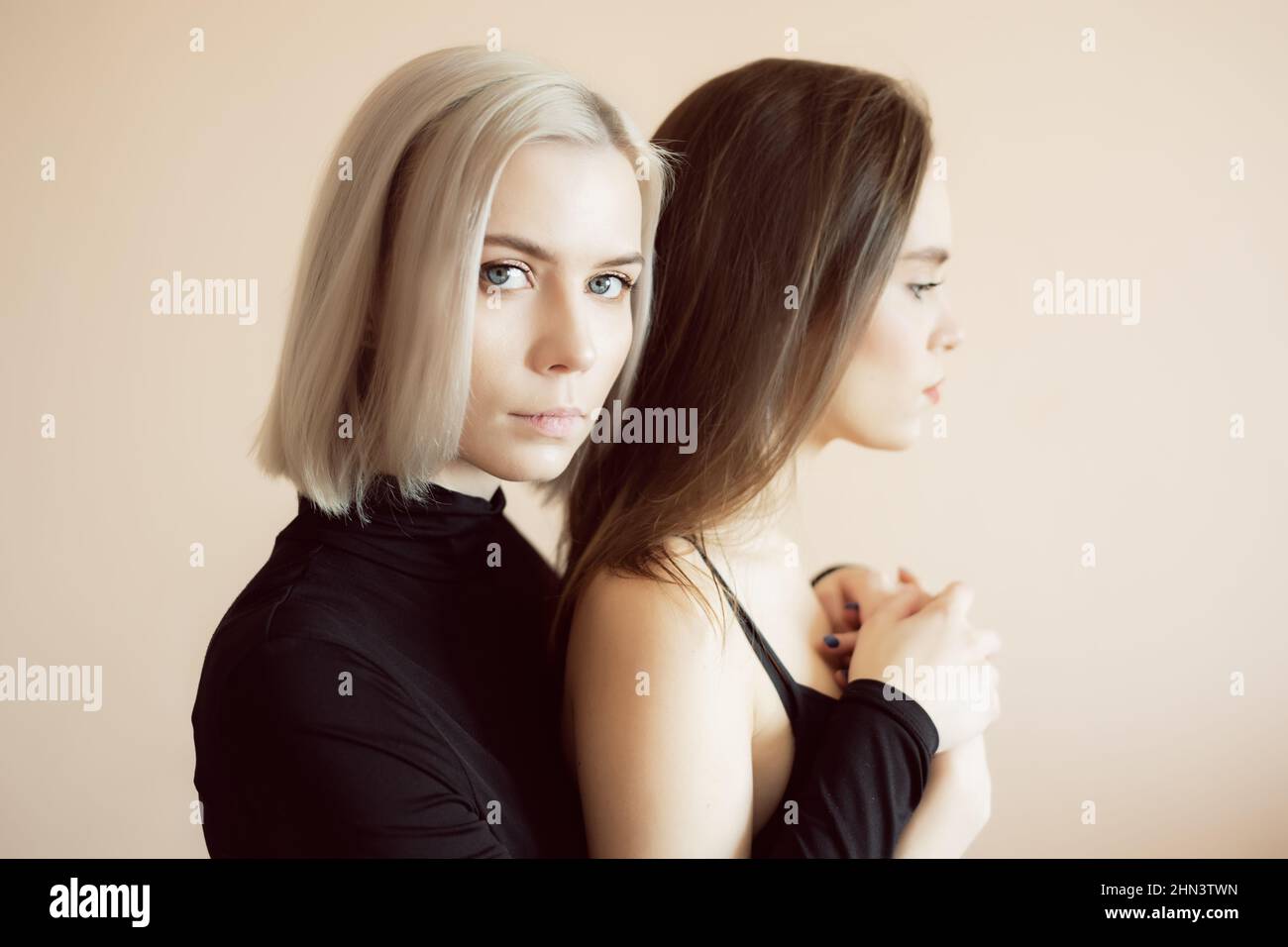 Top view of two young women on a light background Stock Photo - Alamy