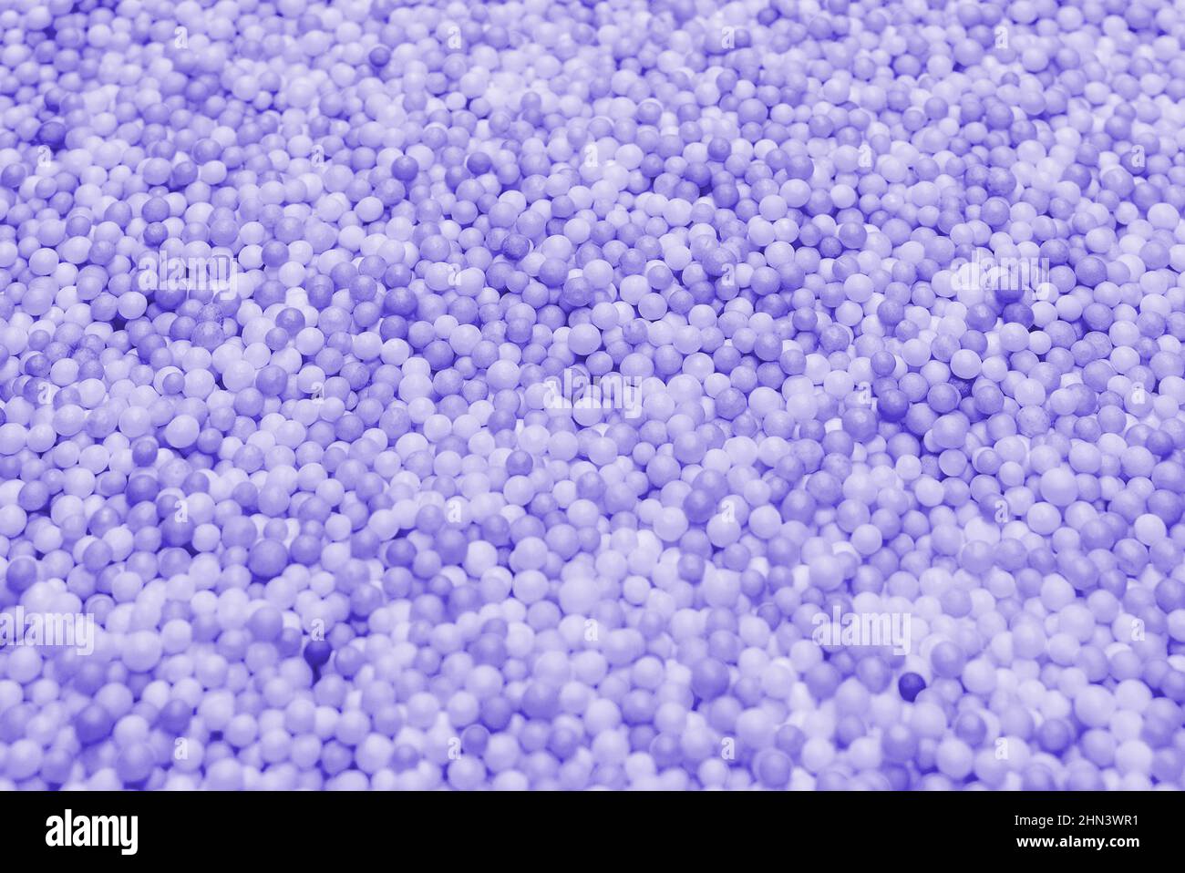Purple plastic balls background. Top view Stock Photo - Alamy