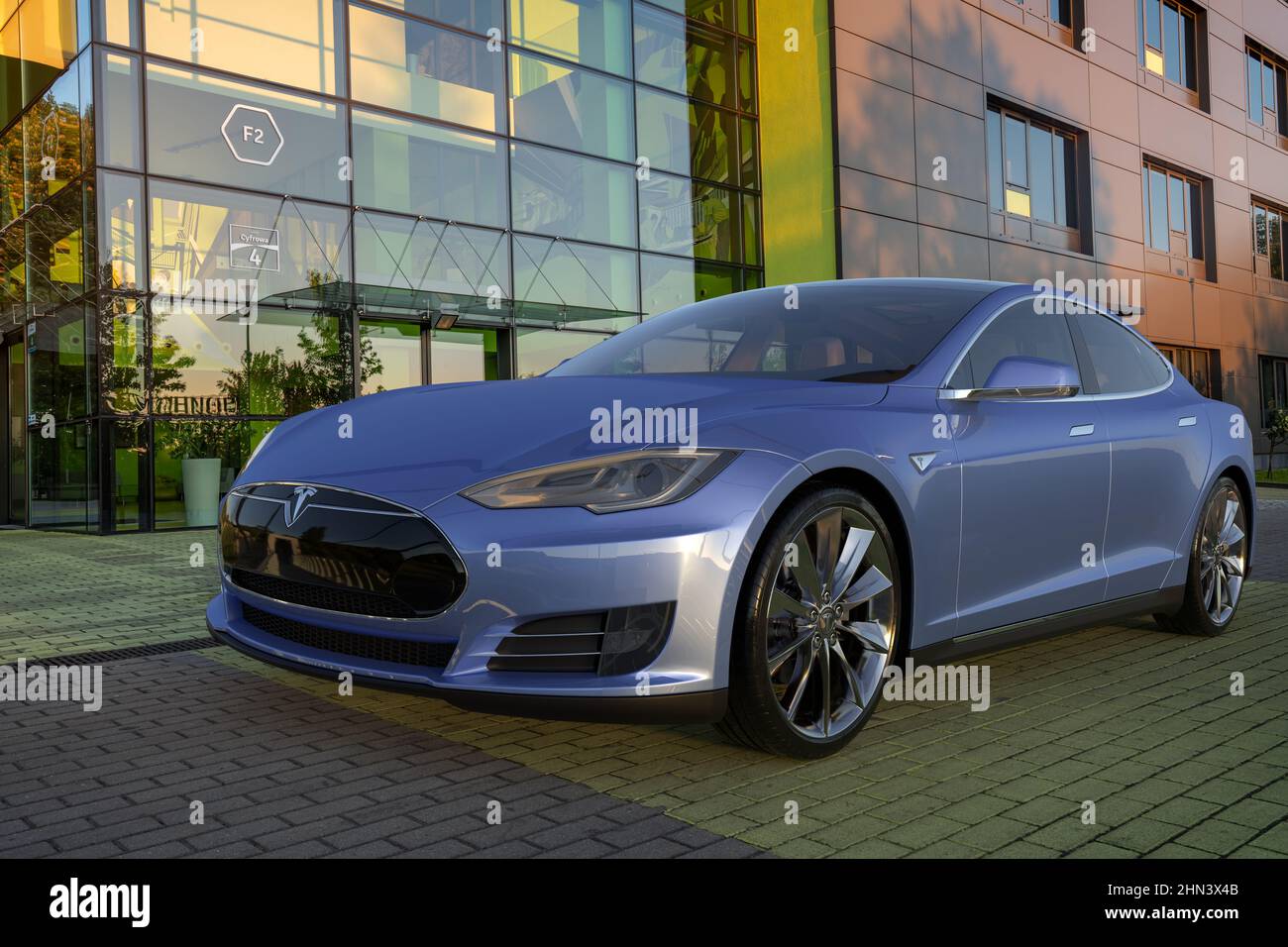 Tesla Model S parked in front of a modern building Stock Photo - Alamy