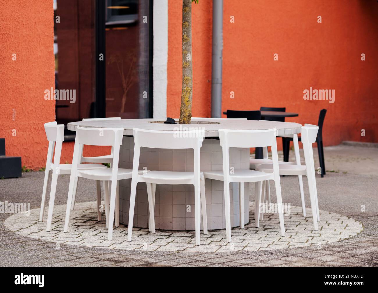 Street cafe. empty chairs around the table of a street restaurant Stock ...