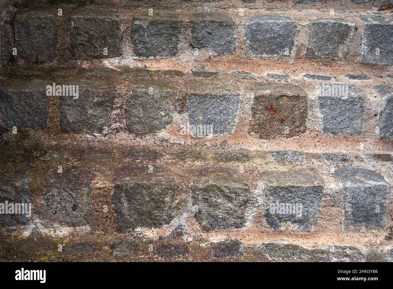 Old stone staircase close-up. crumble with age. construction, repair ...