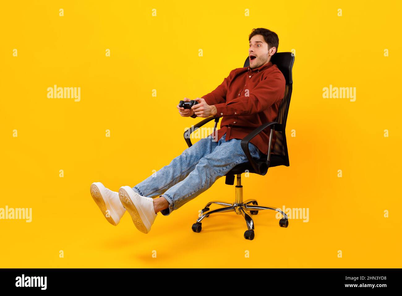 Gamer Guy Playing Video Game Holding Controller Sitting, Yellow ...