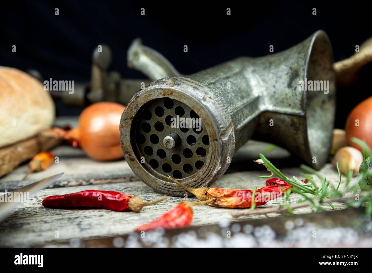 Old meat grinder on the kitchen table Stock Photo - Alamy