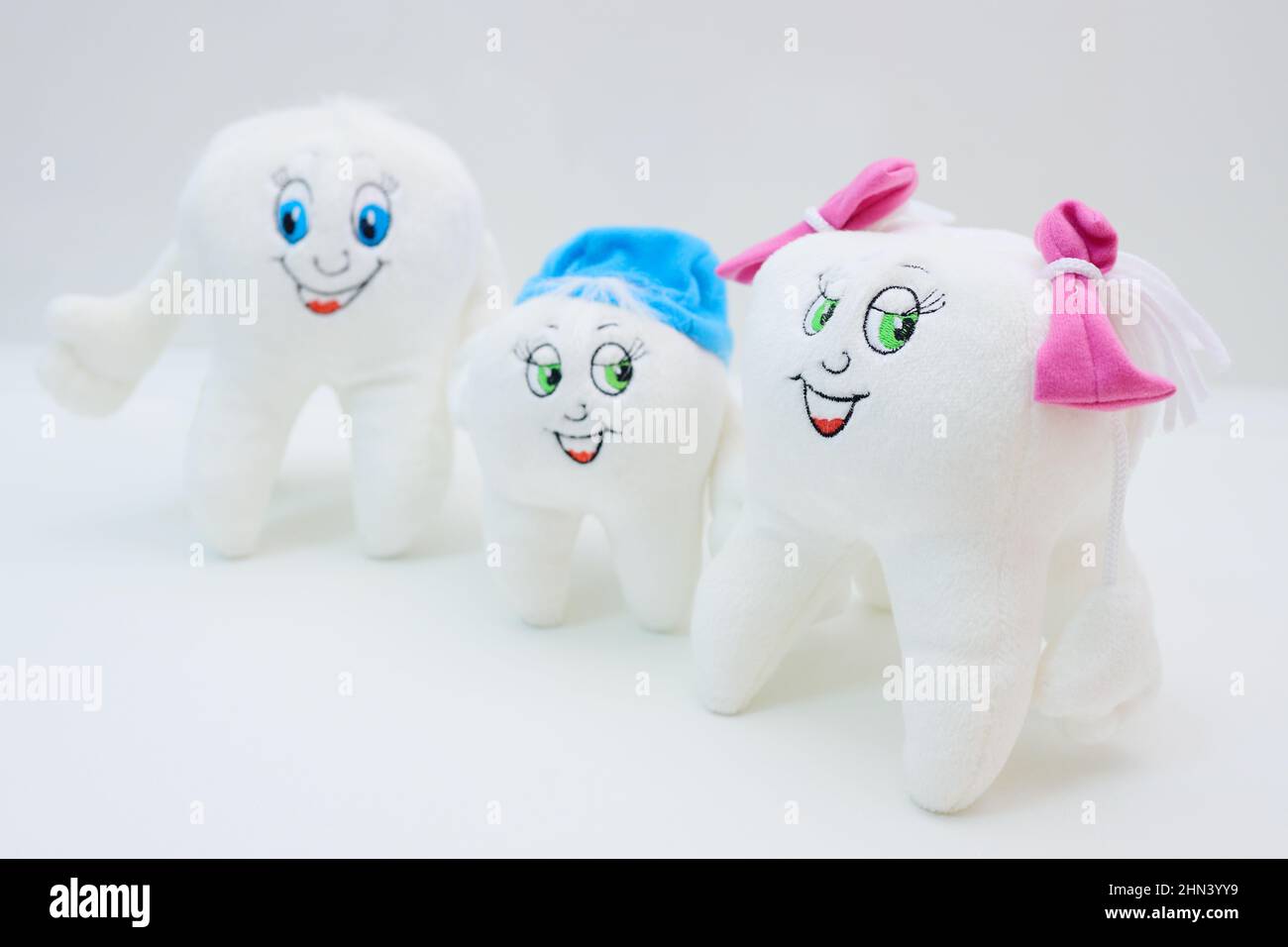 soft toys - a cheerful family of teeth Stock Photo - Alamy