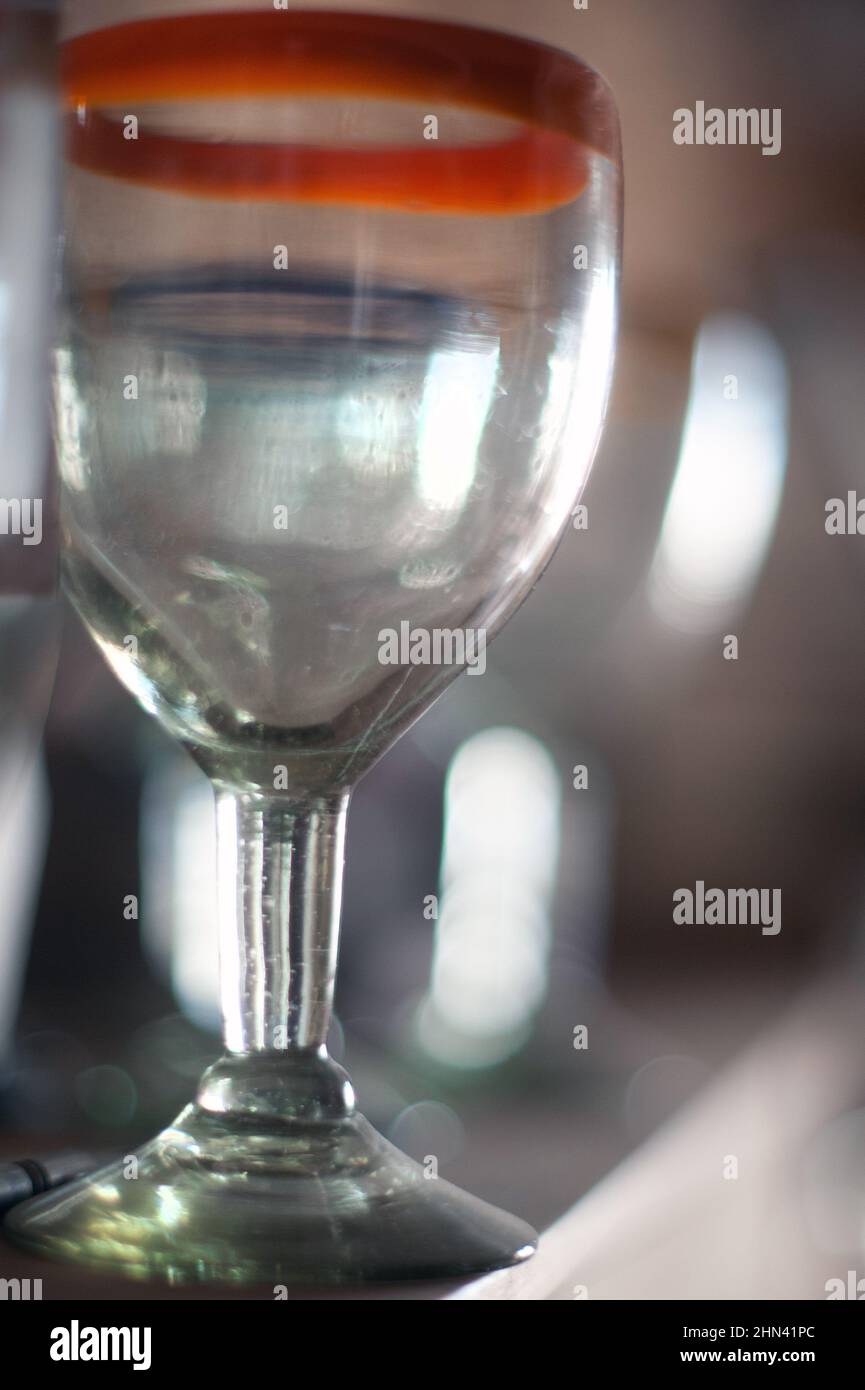 Wine glass with orange rim Stock Photo - Alamy