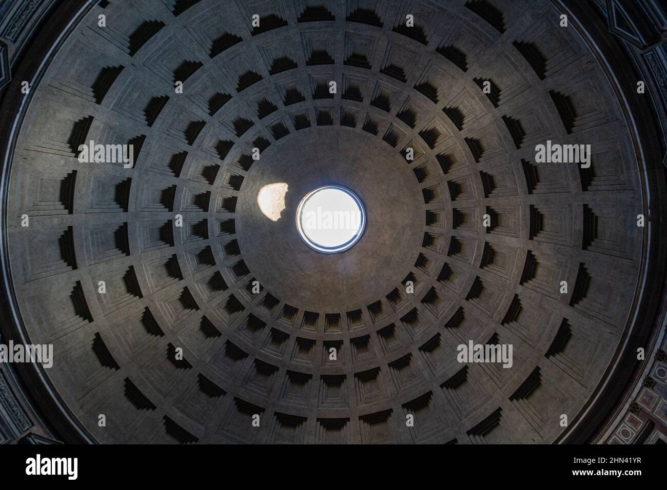Low angle of a black antique stone building ornamented dome with a ...