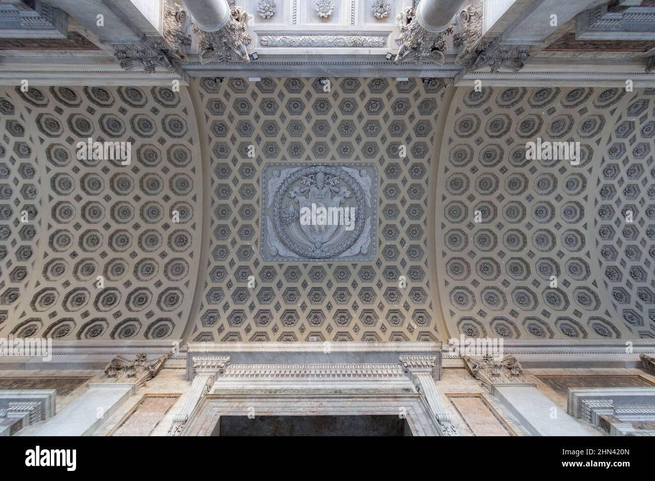 Low angle of a white antique stone building dome ornamented with ...