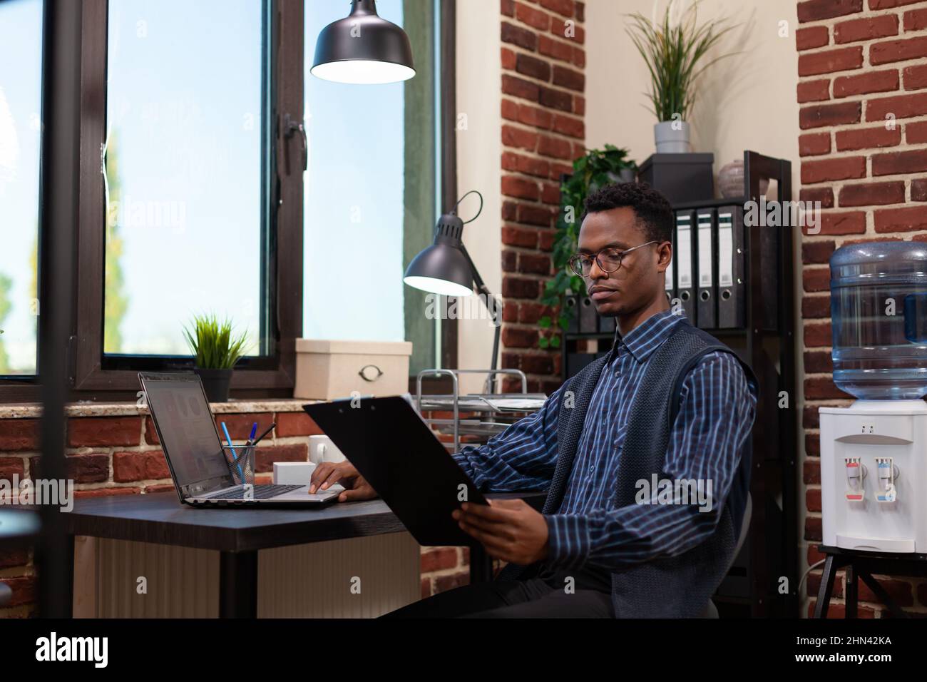 Employee comparing data on hi-res stock photography and images - Alamy