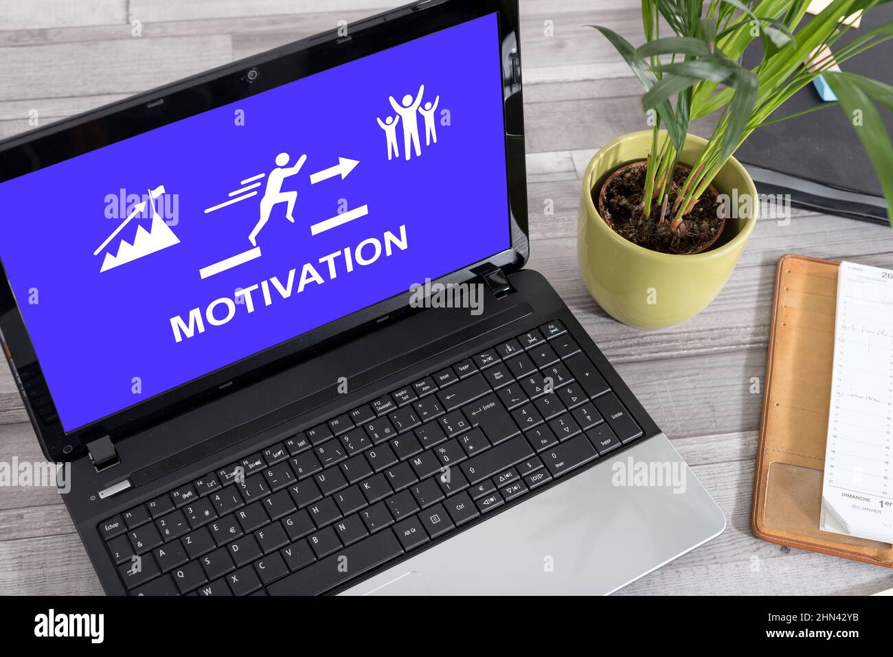 Laptop screen with motivation concept Stock Photo - Alamy