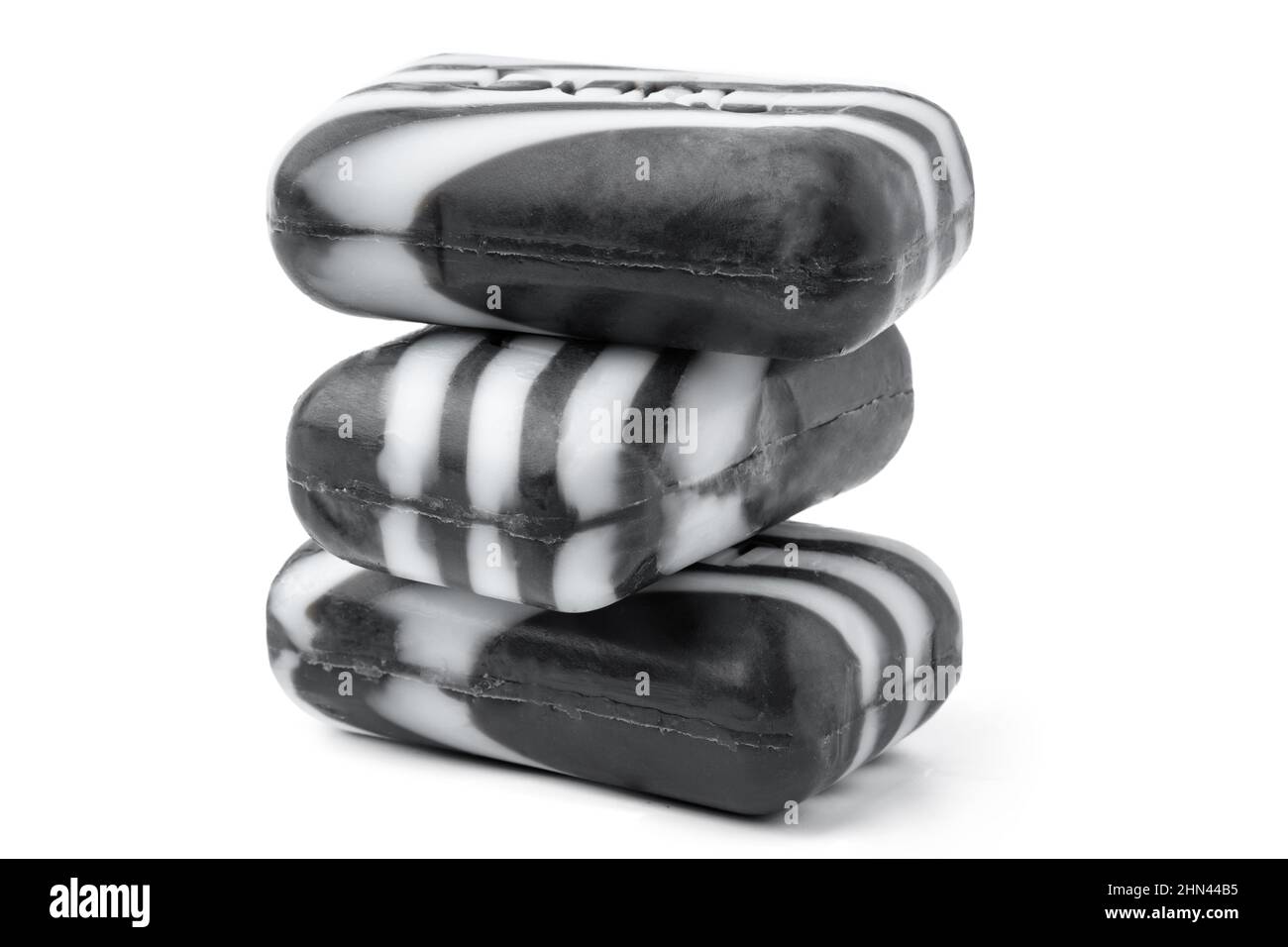 Stacked pieces of natural handmade soap on white background Stock Photo ...