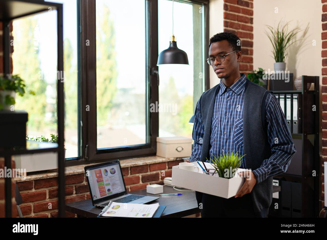 African american entrepreneur with glasses quitting his job having ...