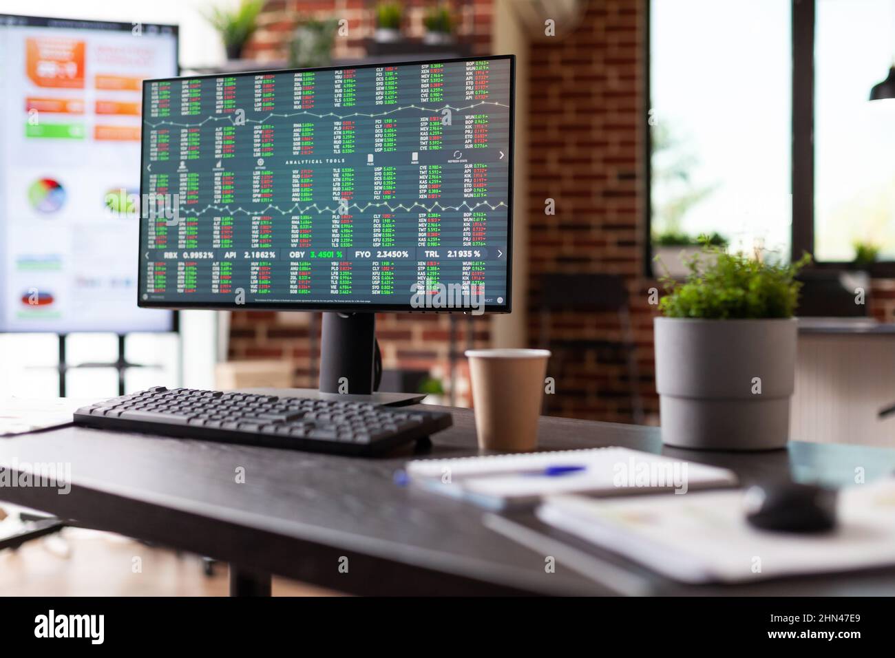 Empty desk with stock market exchange on monitor, used for crypto ...