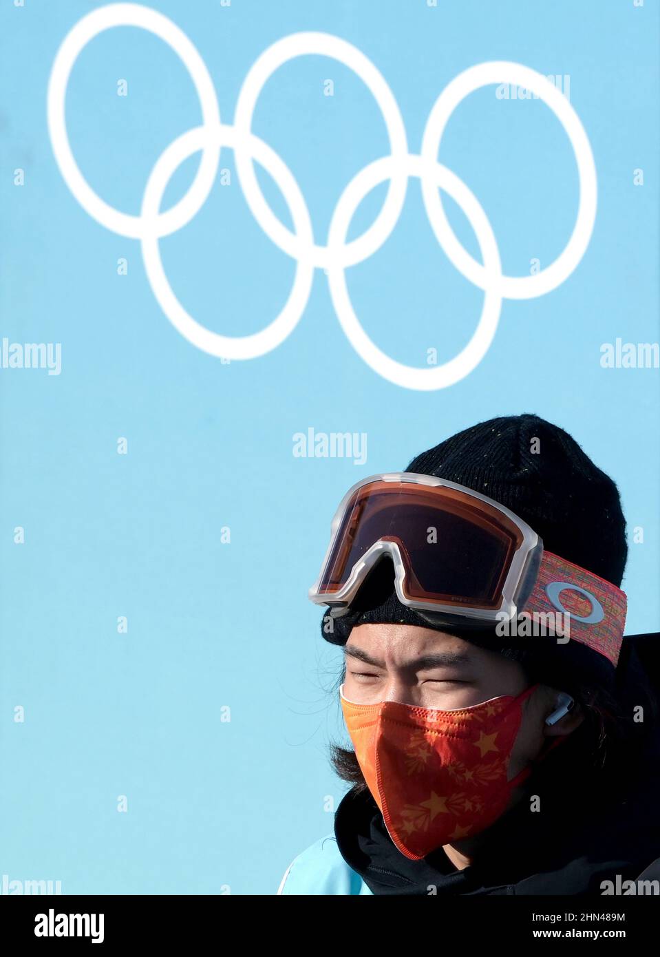 Beijing, China. 14th Feb, 2022. Su Yiming of China reacts after the men ...