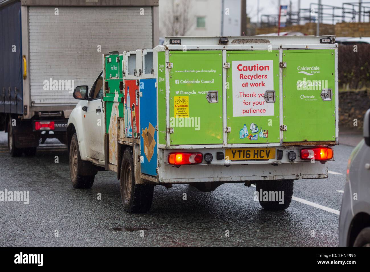 A Calderdale recycling van on the road in West Yorkshire, UK. The ...