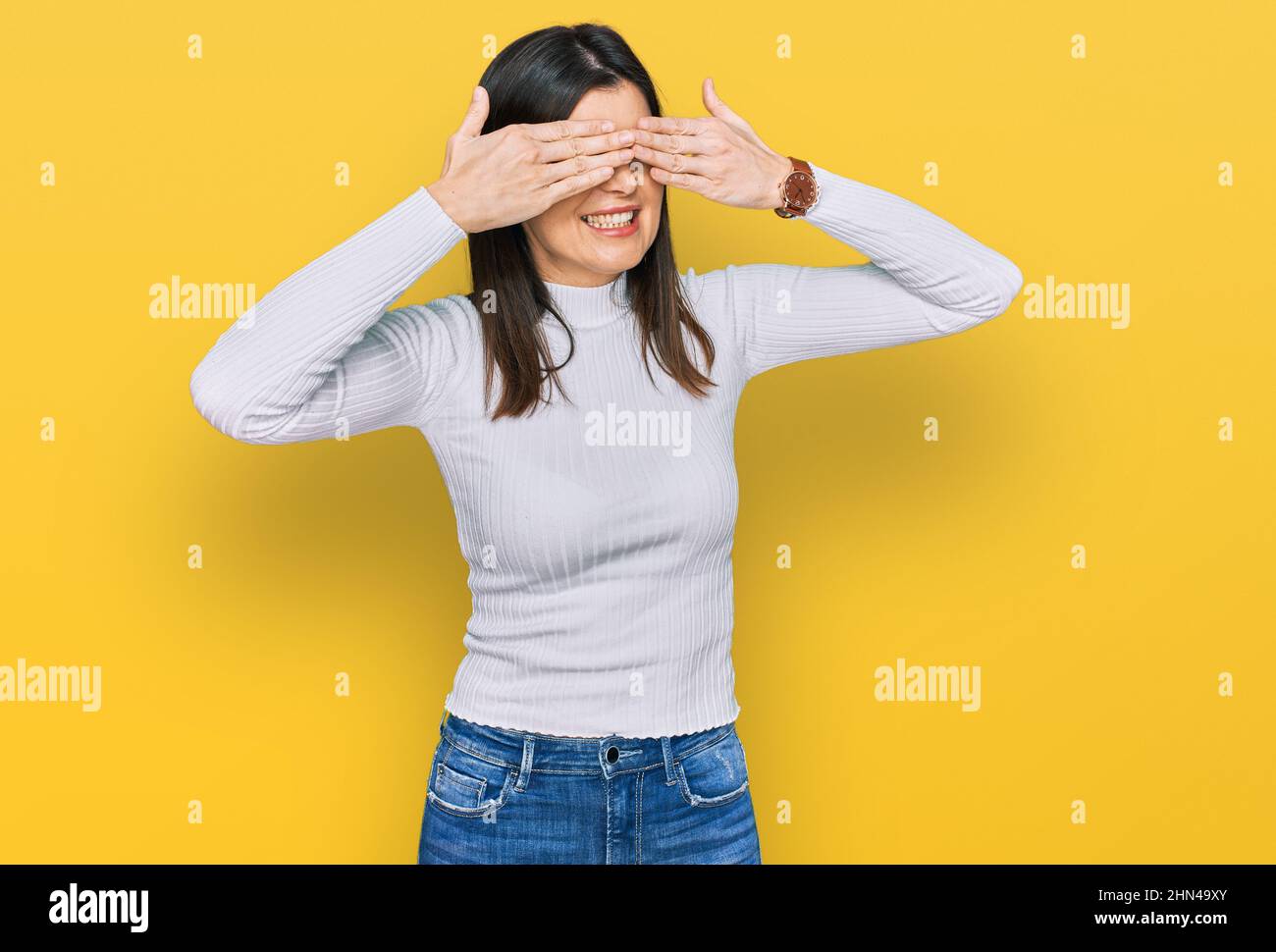 Beautiful Brunette Woman Wearing Casual Clothes Covering Eyes With