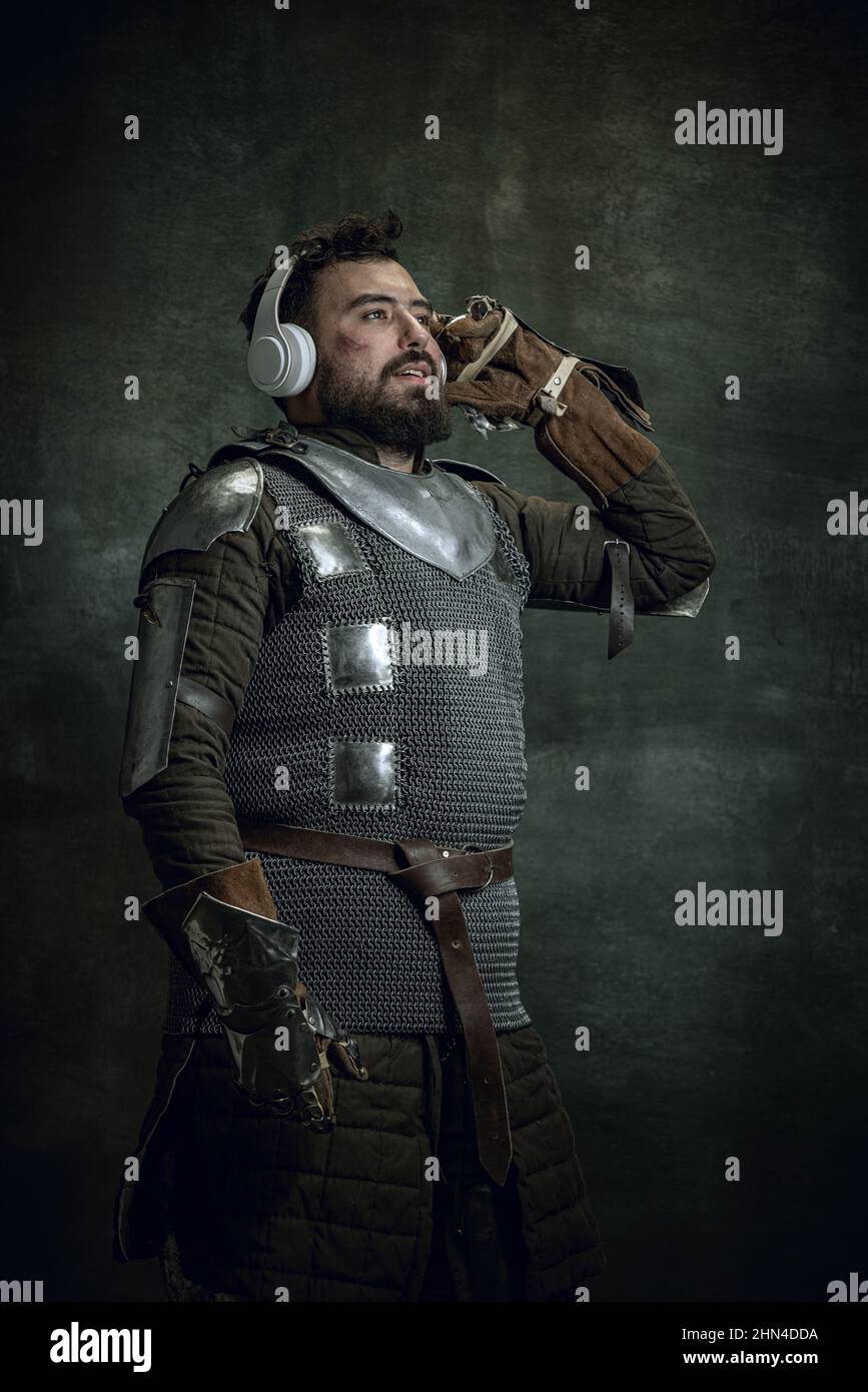 Romantic medieval warrior or knight with dirty wounded face in ...