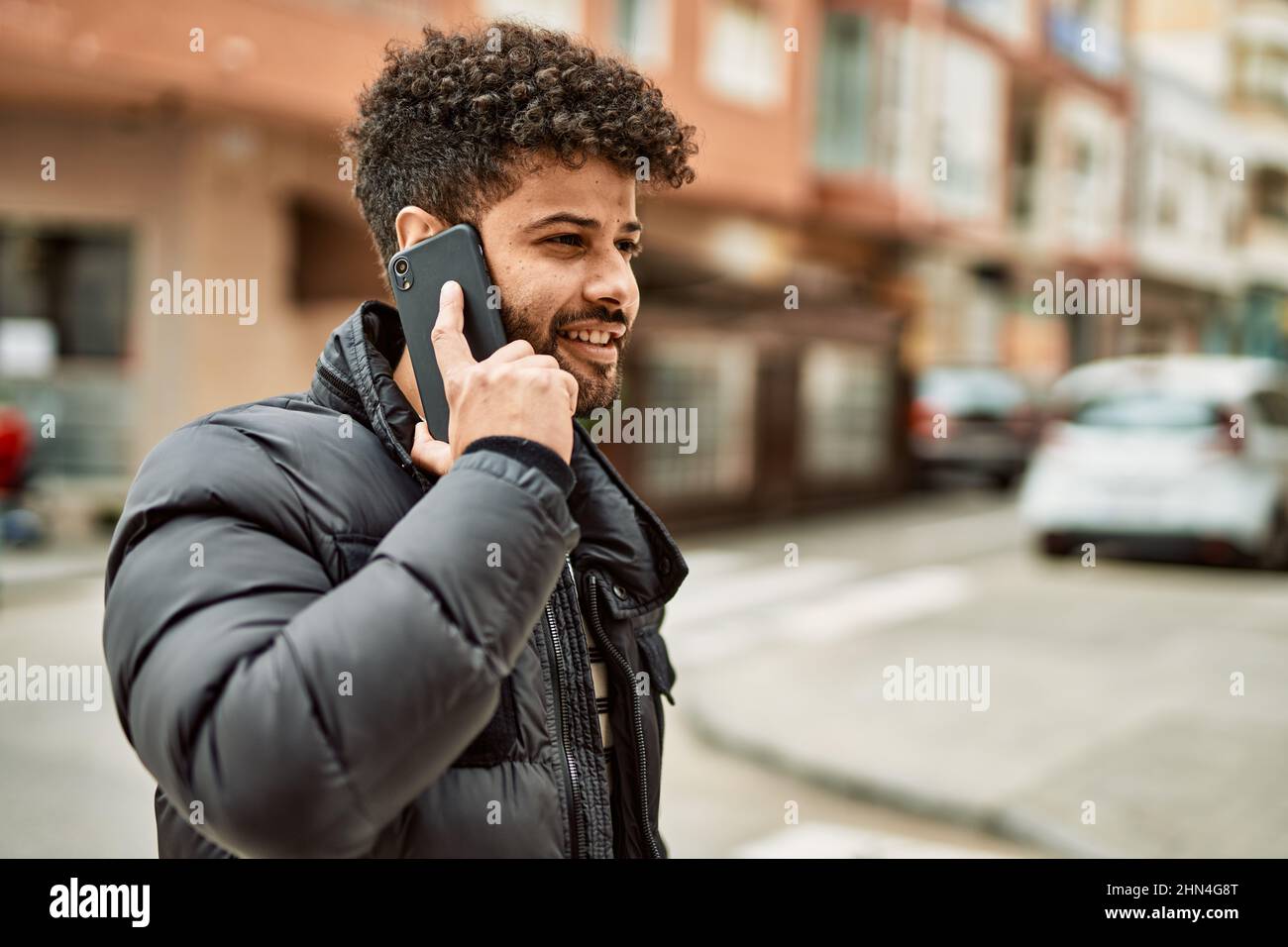 Young arab man speaking on the phone outdoor at the town Stock Photo ...
