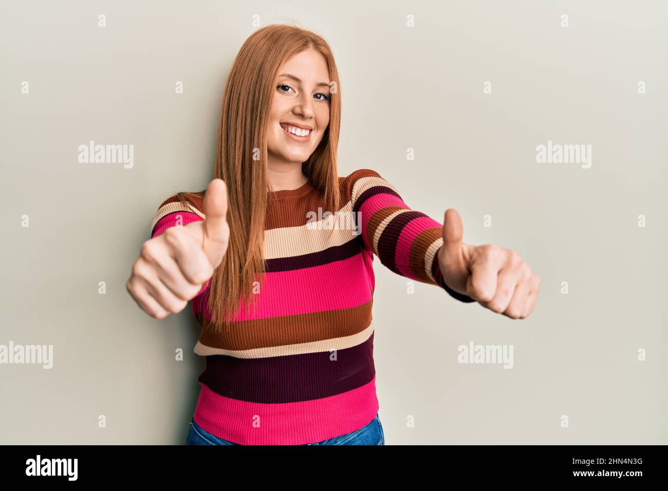 Young irish woman wearing casual clothes approving doing positive ...