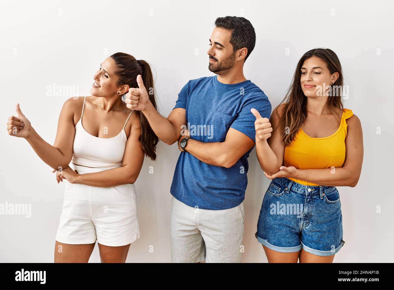 Group of young hispanic people standing over isolated background ...
