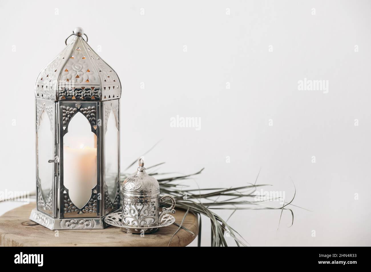 Ramadan still life. Closeup of silver Moroccan, Arabic lantern. Cup of ...