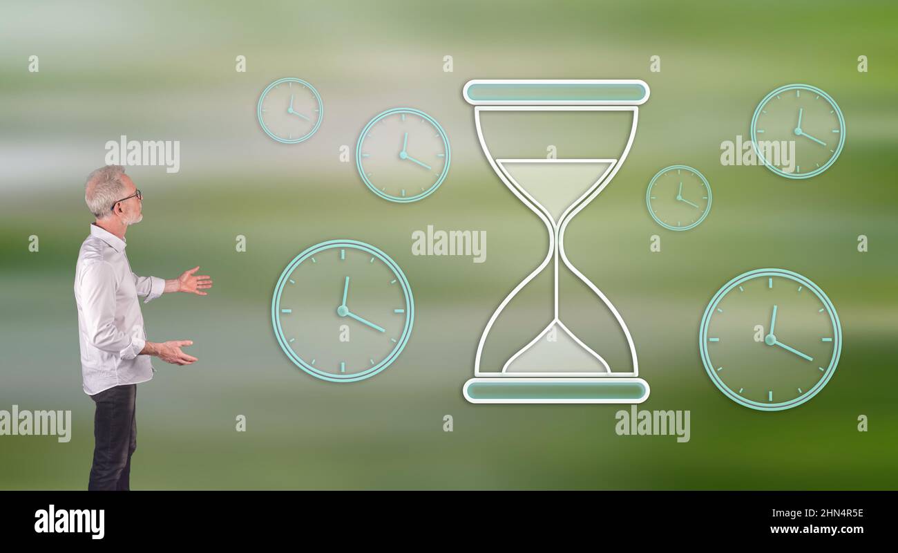 Businessman showing a time management concept on a wall screen Stock ...