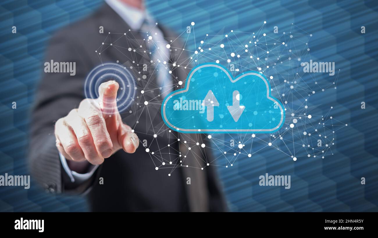 Man touching cloud storage concept on a touch screen with his fingers ...