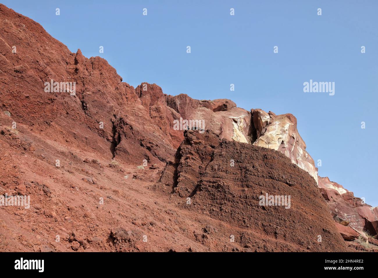 The volcanic landscape of the red beach in Santorini Greece Stock Photo ...