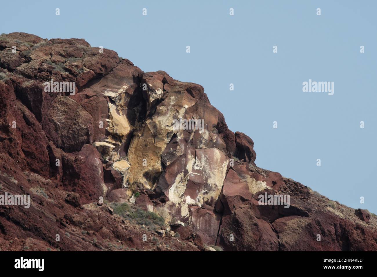The volcanic landscape of the red beach in Santorini Greece Stock Photo ...