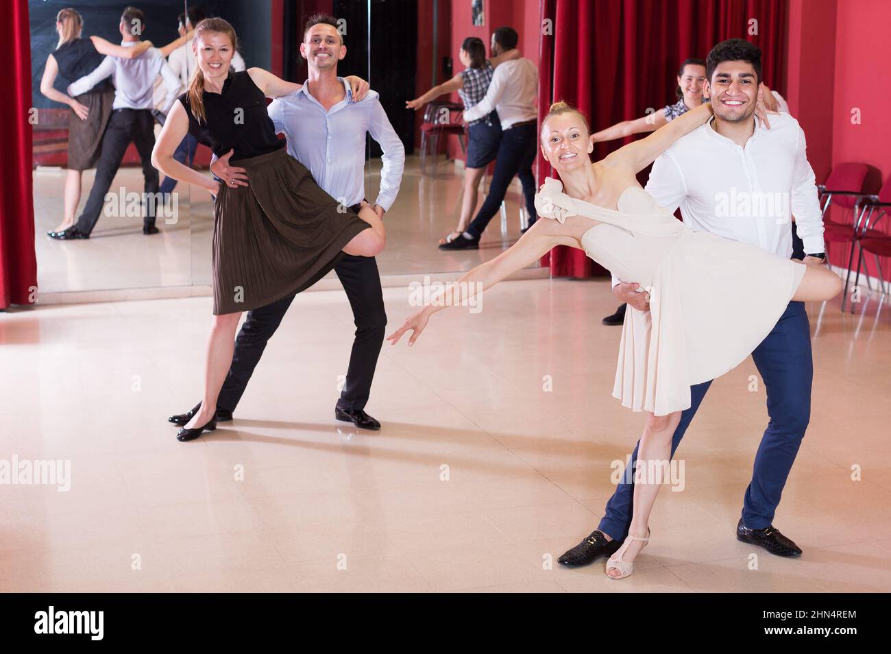 Happy people dancing samba in dance class Stock Photo - Alamy