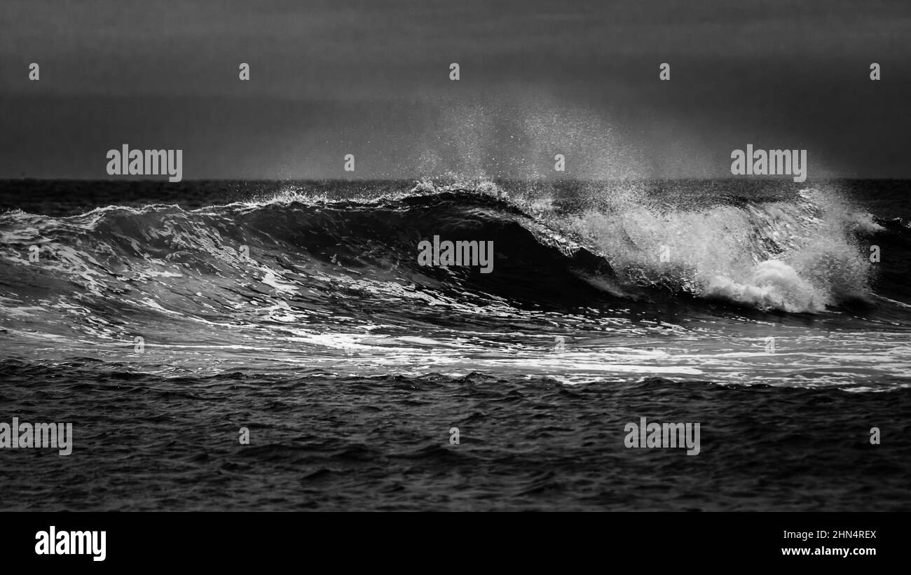 black wave is breaking Stock Photo - Alamy