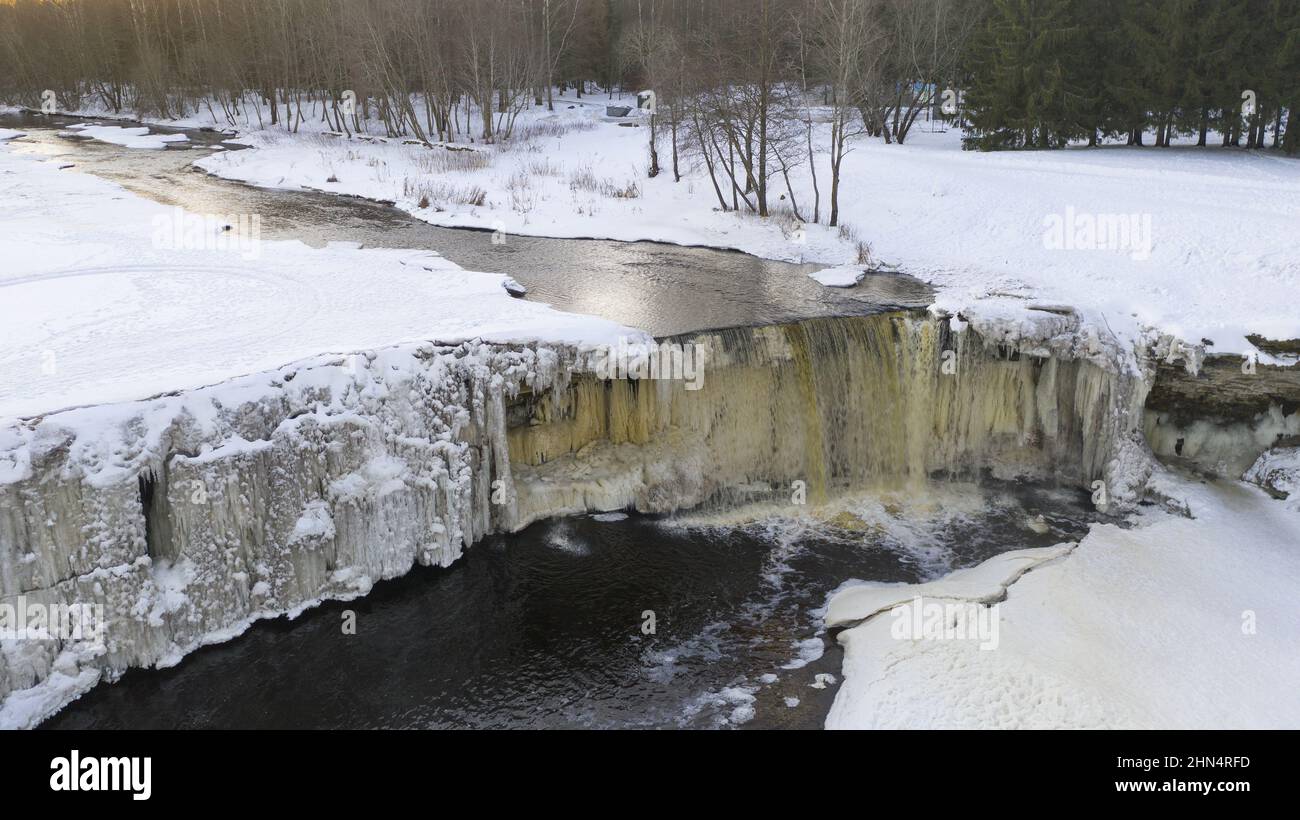 Aerial view to the winter ice clad waterfall on limestone cliff Stock ...