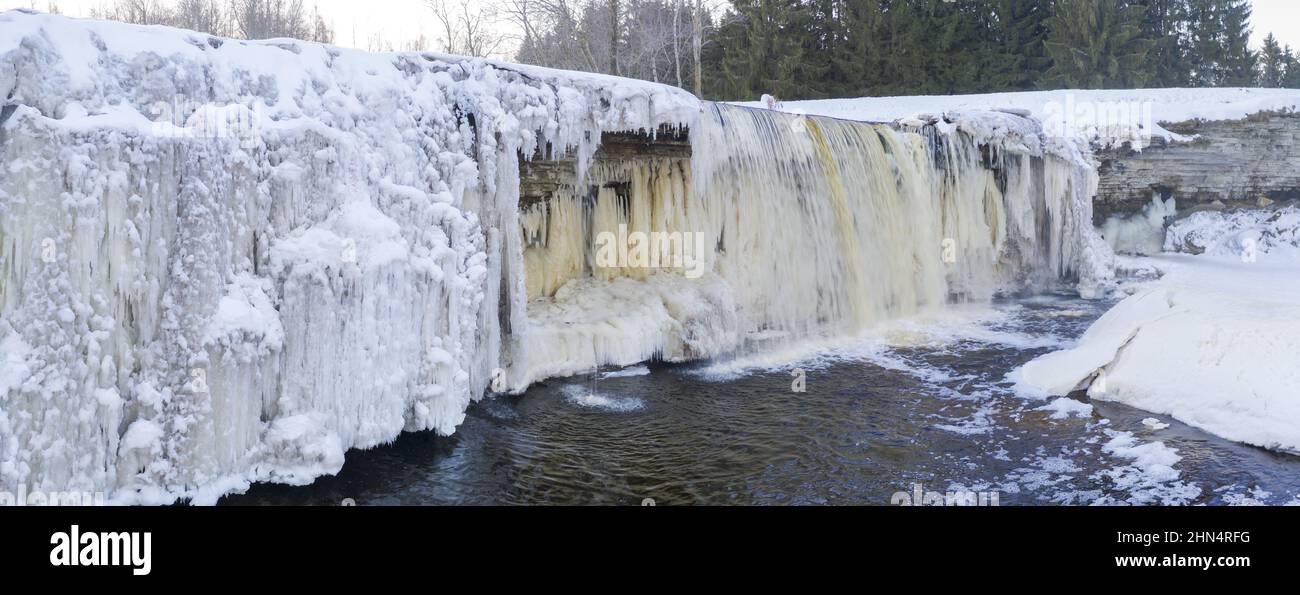 Aerial view to the winter ice clad waterfall on limestone cliff Stock ...
