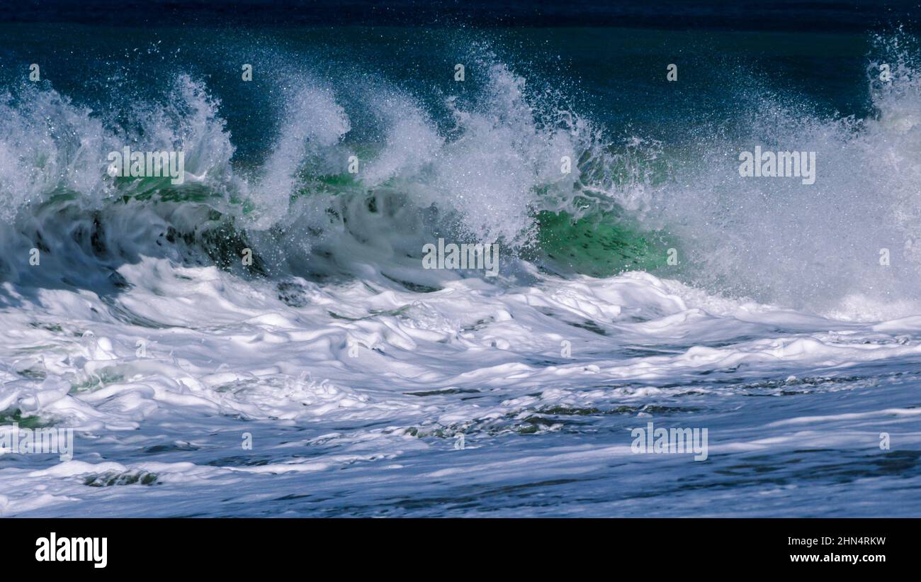 Breaking Wave on a beach Stock Photo - Alamy