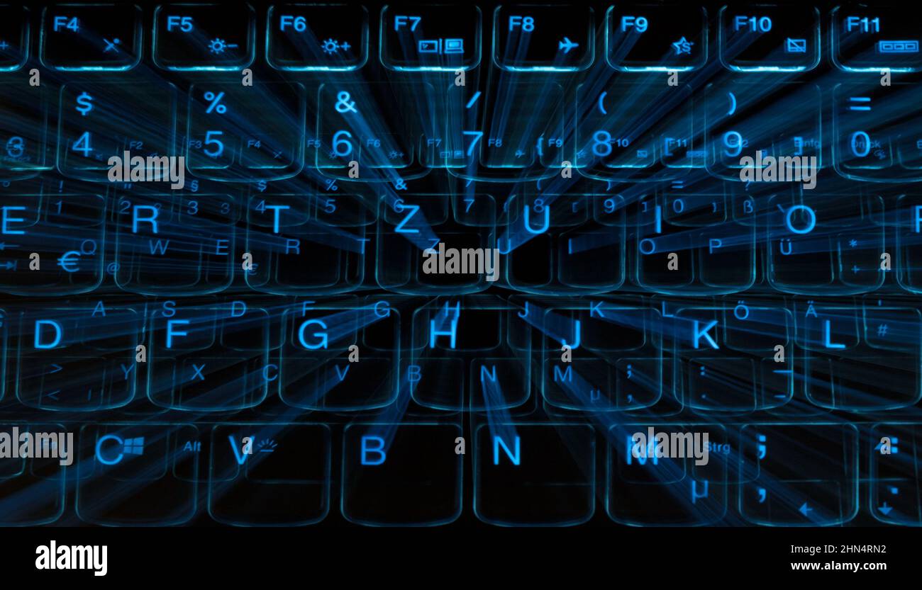 Digitalization with blue illuminated keyboard Stock Photo - Alamy