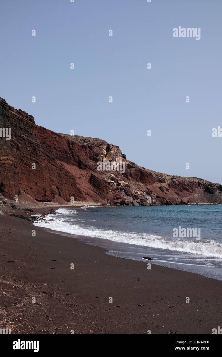 Panoramic view of the famous red beach on a windy day in Santorini ...