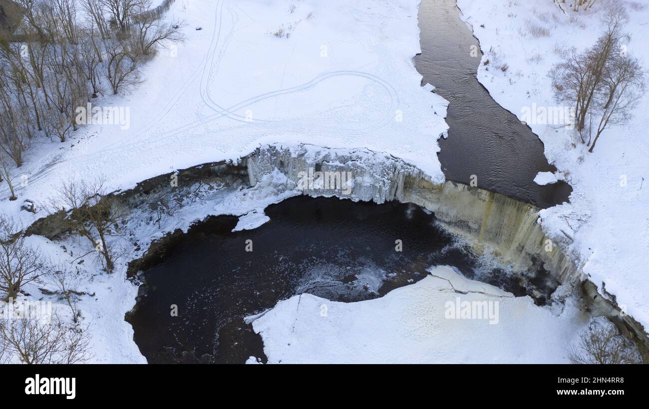 Aerial view to the winter ice clad waterfall on limestone cliff Stock ...