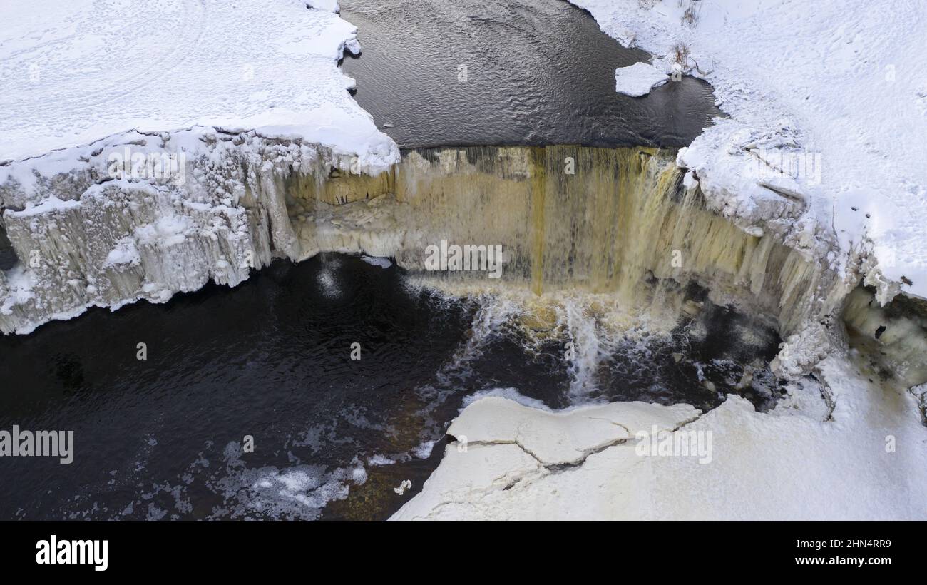 Aerial view to the winter ice clad waterfall on limestone cliff Stock ...