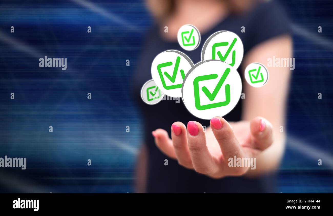 Validation concept above the hand of a woman in background Stock Photo ...