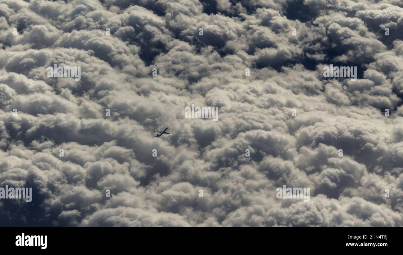 Flying over the clouds Stock Photo - Alamy