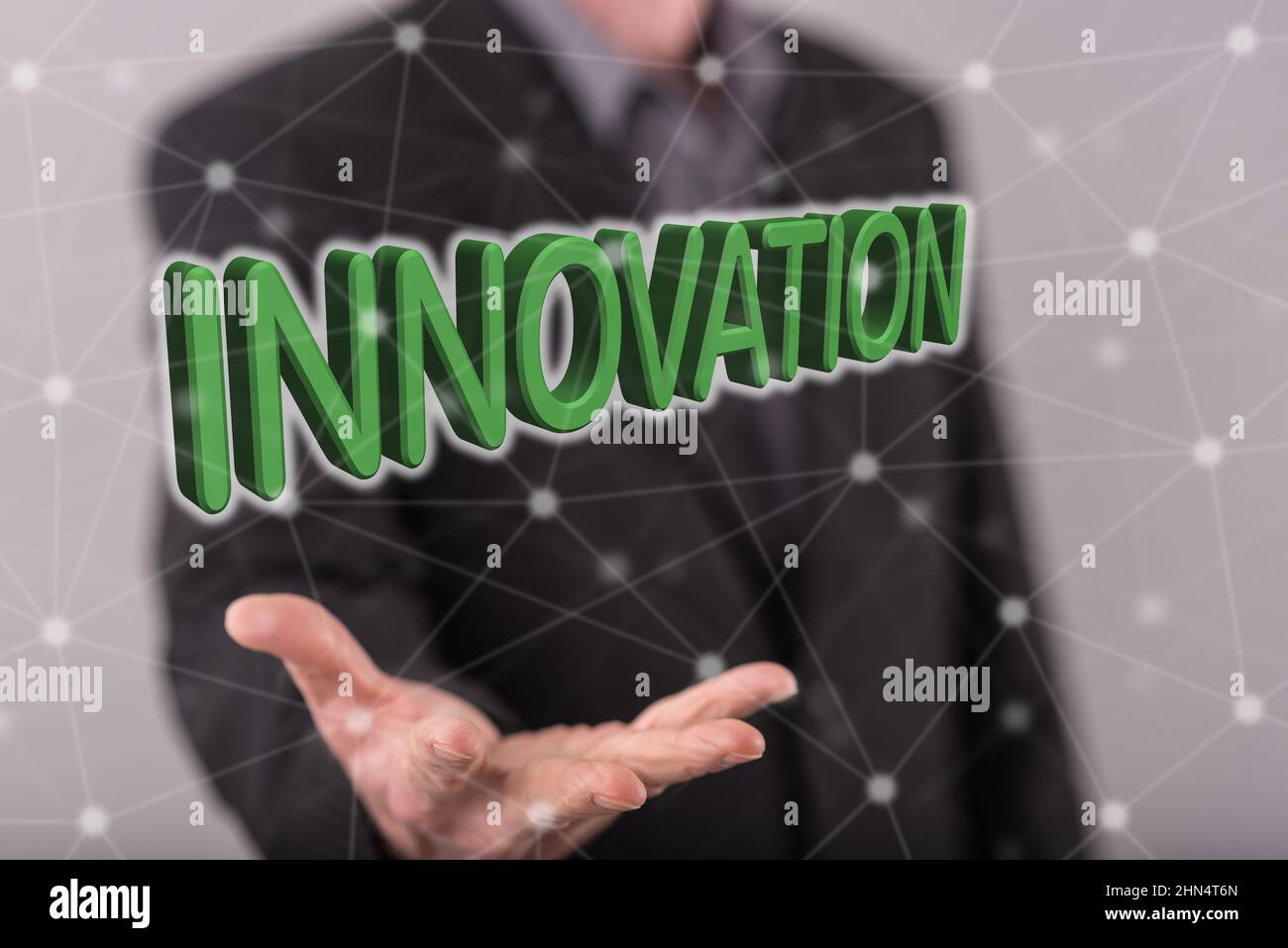 Innovation concept above the hand of a man in background Stock Photo ...