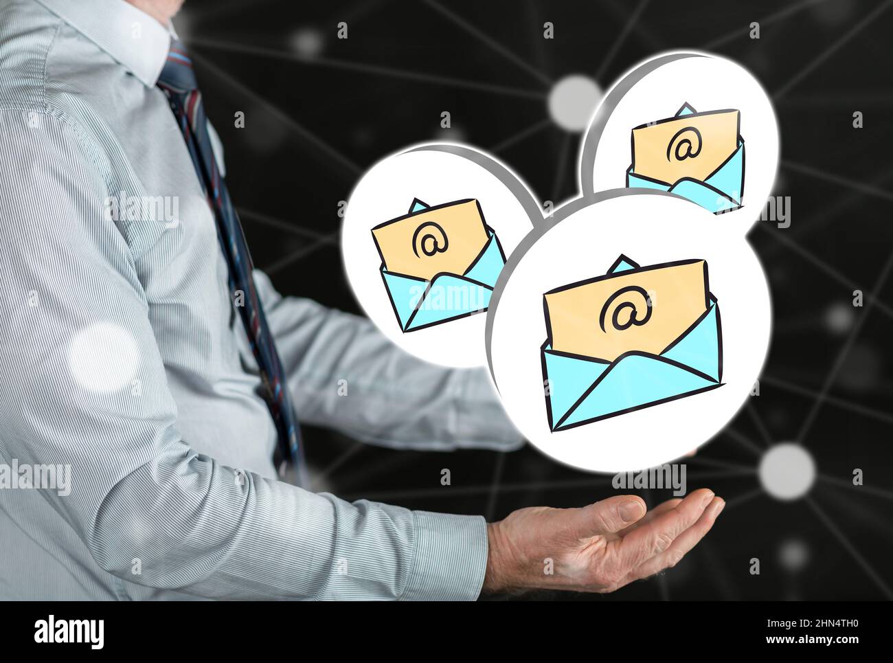 E-mail concept above the hands of a man Stock Photo - Alamy