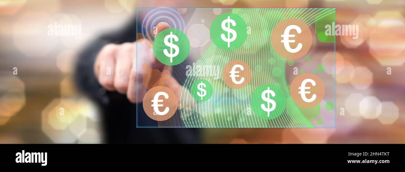 Man touching a currency exchange concept on a touch screen with his ...