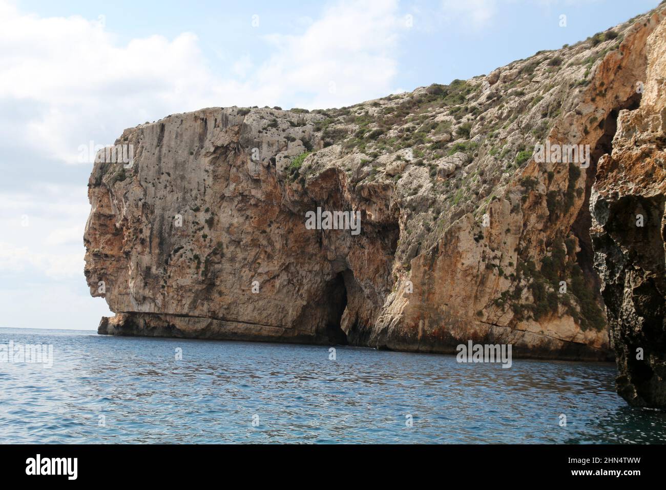Cliffs at the Blue Grotto on the island of Malta Stock Photo - Alamy