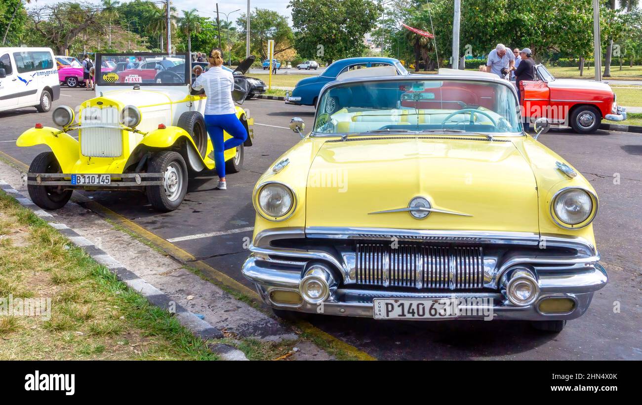 Vintage yellow convertible American car of the brand 'Pontiac'. The ...