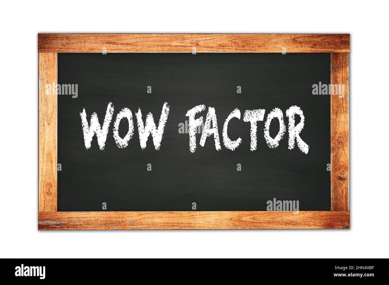 WOW FACTOR text written on black wooden frame school blackboard Stock Photo - Alamy
